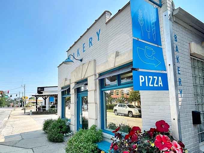 The blue signage announcing bakery and pizza tells you this corner of Athens takes its carbohydrates very, very seriously.