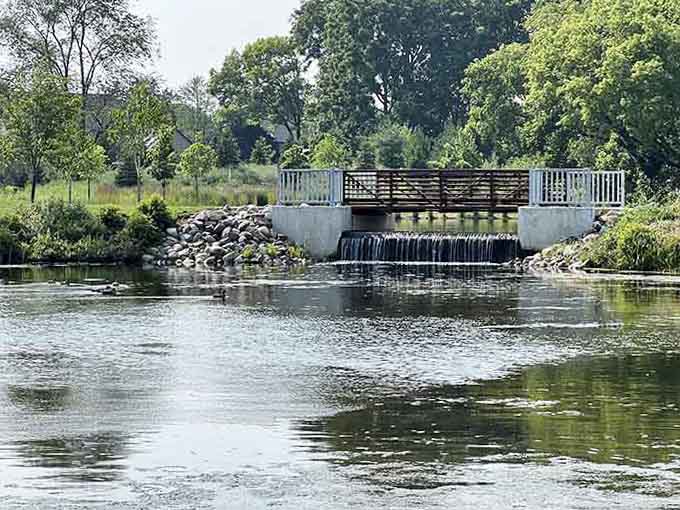The small dam creates soothing water sounds, adding unexpected tranquility to this high-energy family destination spot.