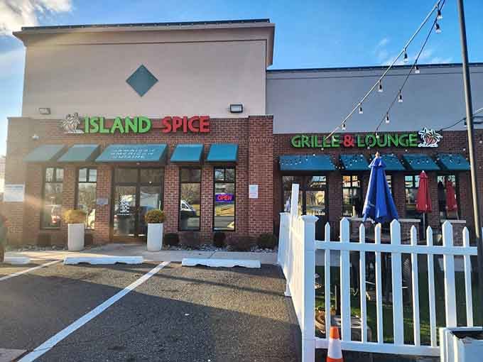 The whole setup welcomes you in, promising authentic flavors just beyond those cheerful doors.