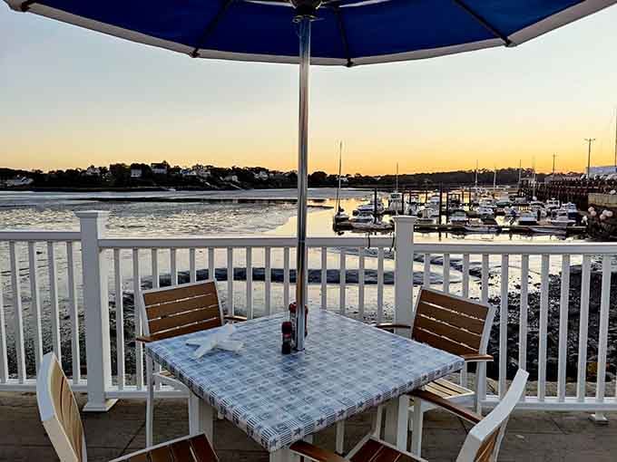 Patio seating at golden hour transforms a simple meal into an unforgettable coastal memory worth repeating.