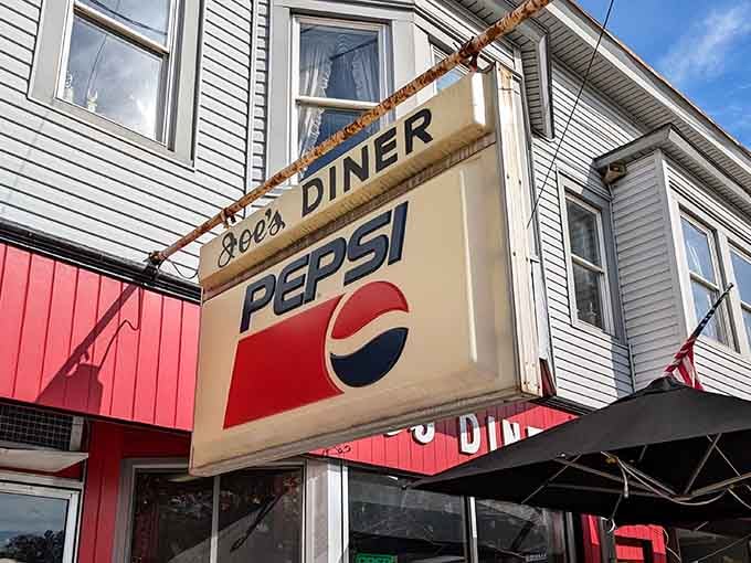 That vintage Pepsi sign hanging proud, a reminder that some things never go out of style.
