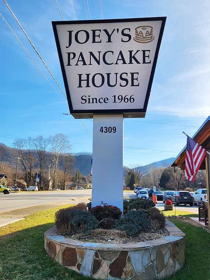 Since 1966, this sign has been guiding hungry travelers to breakfast salvation in the Smoky Mountains with unwavering dedication.