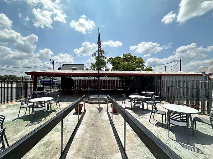 That spacious patio with patriotic flair offers the perfect spot for enjoying your meal under the wide Texas sky.