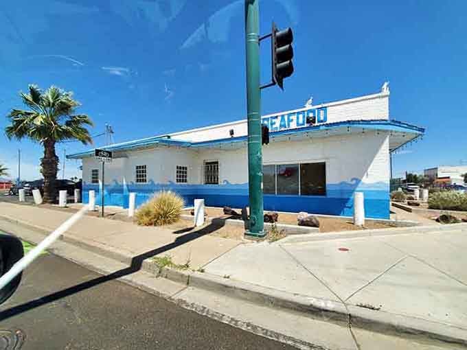 This nautical blue beauty sits proudly on the corner, looking like a ship that sailed inland and decided to stay forever.