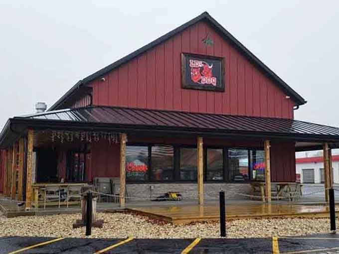 The barn-style building with covered patio seating makes this more destination than simple restaurant stop.
