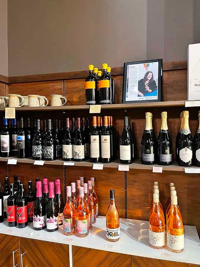 The gleaming display case showcases rows of handcrafted chocolates like edible art in the world's most tempting museum.