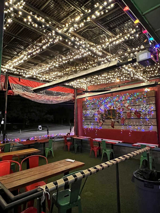 Outdoor seating wrapped in lights proves the party doesn't stop when you step outside for fresh air.