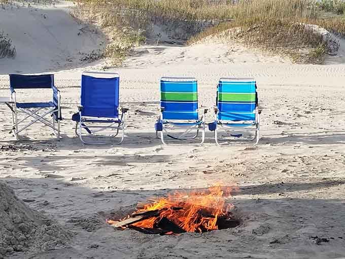 Beach chairs circling a bonfire is the coastal version of gathering around the campfire telling stories.