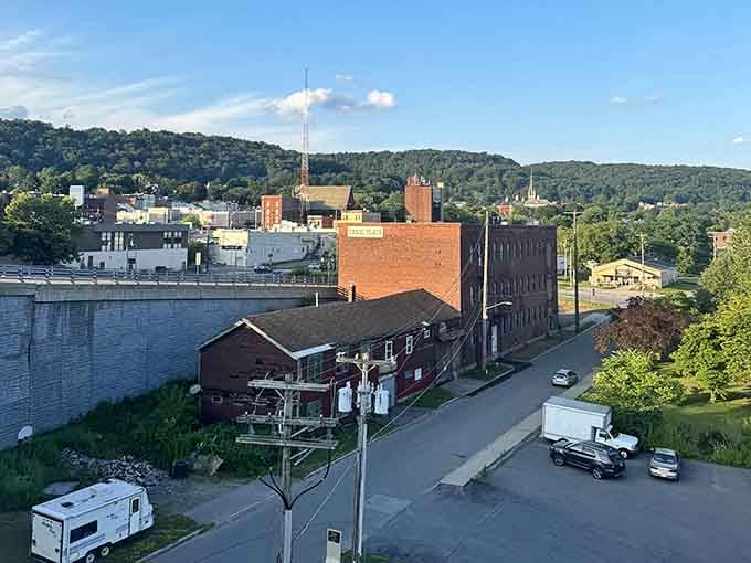 The town view reveals Little Falls nestled in the valley, a hidden gem producing cheese that rivals anything from across the pond.