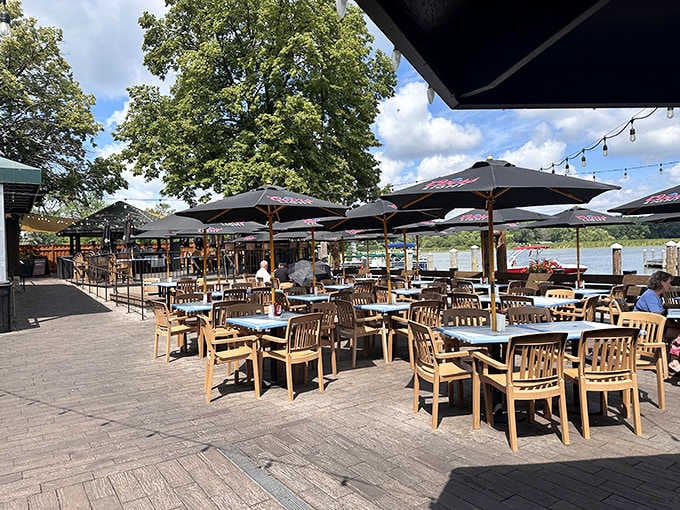 Lakeside seating with umbrellas and a view that'll make you want to call in sick tomorrow and stay all day.