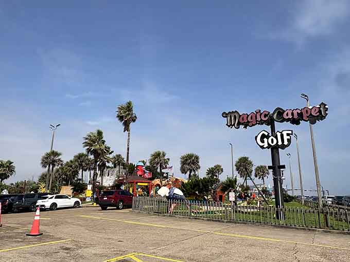 The iconic Magic Carpet Golf sign stands tall, promising adventures in putting and memories worth making together.