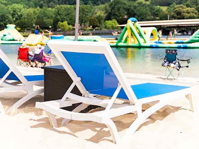 Beach chairs positioned perfectly for watching others wipe out while you recover from your own spectacular aquatic failures.