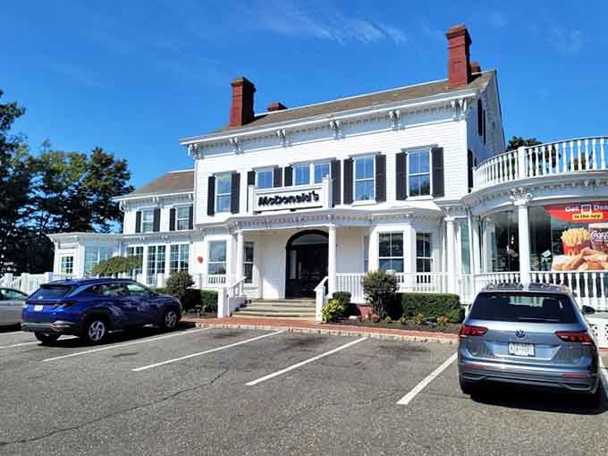 Colonial mansion meets parking lot in the most delightfully confusing real estate situation Long Island ever created.