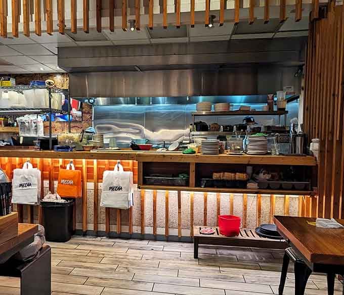 The open kitchen lets you watch the magic happen, because great food deserves an audience.