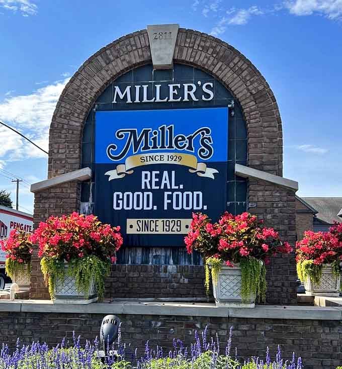 The iconic Miller's sign proudly declares "Real. Good. Food." and delivers on every single promise made.