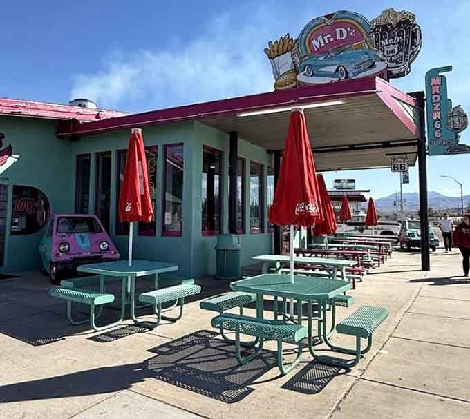 Outdoor seating on Route 66 means watching history roll by while your milkshake slowly, deliciously disappears.