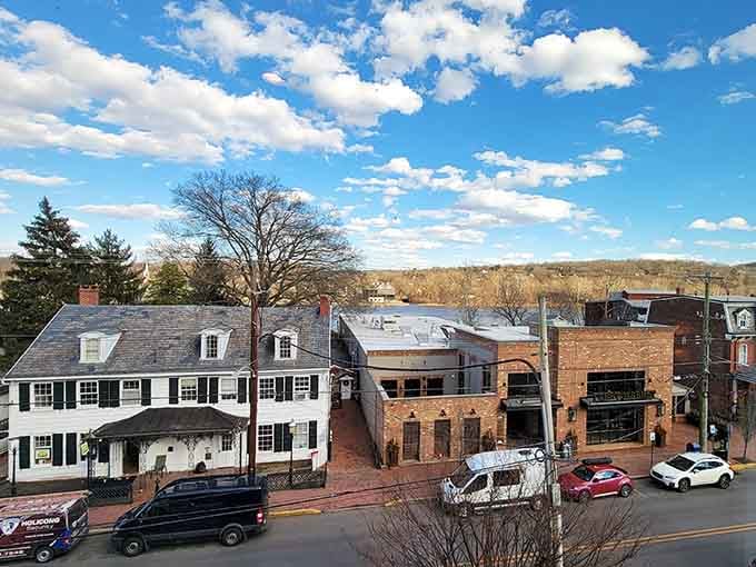 Rooftops and chimneys stretching toward the hills, painting a postcard scene that Instagram filters could never improve upon.