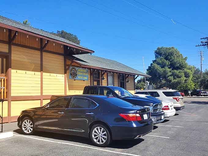 That parking lot represents the beautiful irony of driving your modern car to experience transportation from a bygone era.