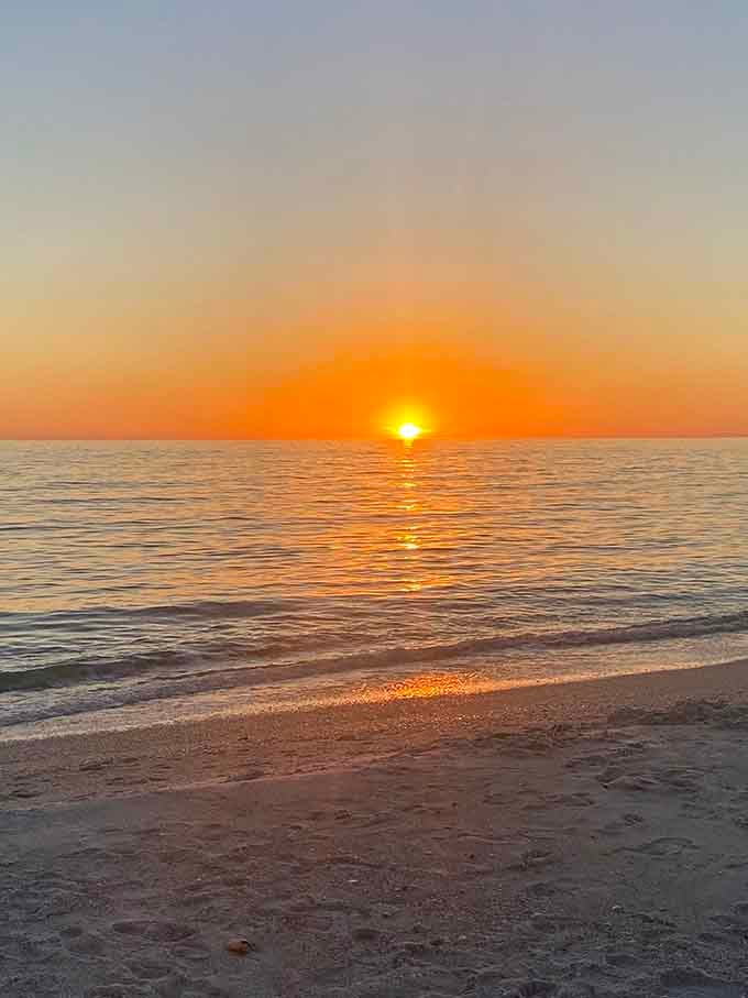 The sun melts into the Gulf in shades of orange and gold, ending another perfect day in paradise.