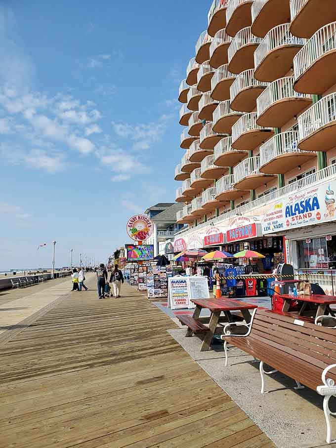 Boardwalk establishments line up like old friends, each offering their own flavor of seaside hospitality and fun.