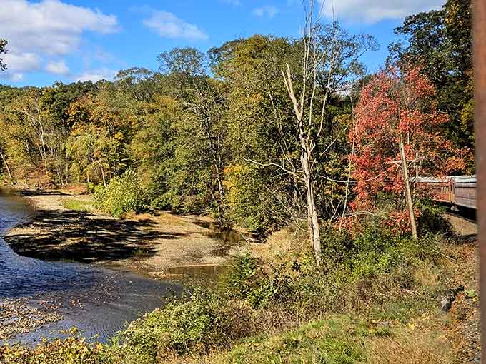 Autumn paints the hillsides in colors so vivid they almost don't seem real from your window seat vantage.