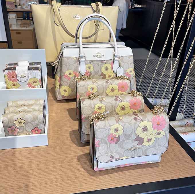 Designer handbags at prices that won't require explaining to your spouse later tonight.