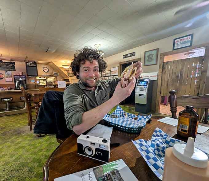 Pure joy captured: when your sandwich exceeds expectations and you can't wait to tell everyone about it.