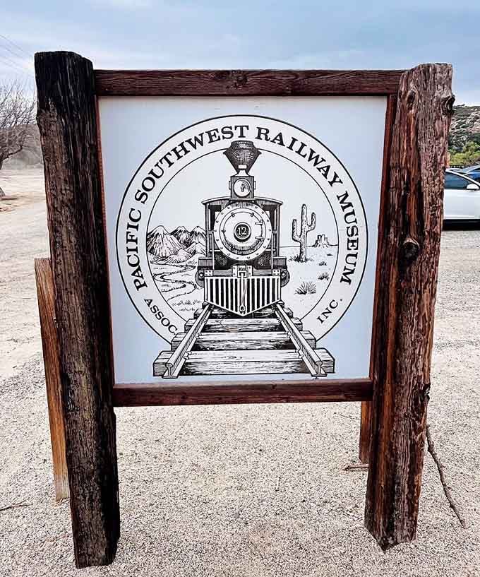 The museum's welcoming sign featuring a classic locomotive, because first impressions should always include a friendly steam engine.