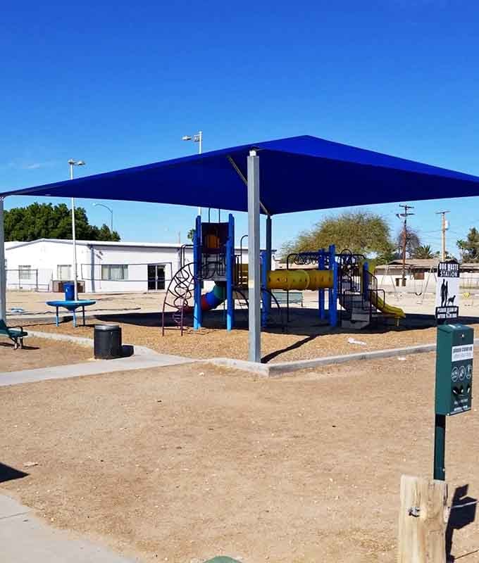 Pop Harvey Park's shaded playground proves Parker takes family fun seriously, even in desert heat.
