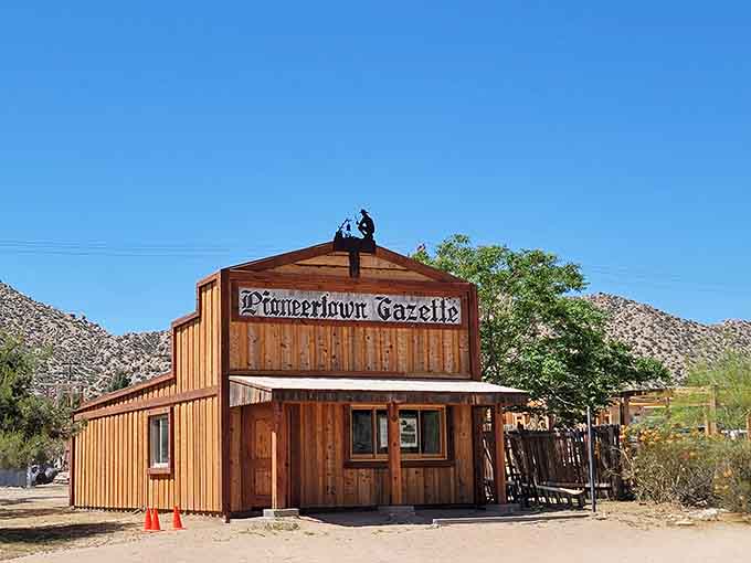 The Pioneertown Gazette building stands proudly, its weathered wood telling stories of when this was Hollywood's favorite Western backdrop.