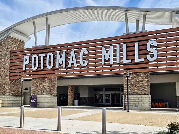 Modern architecture frames the Potomac Mills name like a beacon guiding bargain hunters safely home to savings.