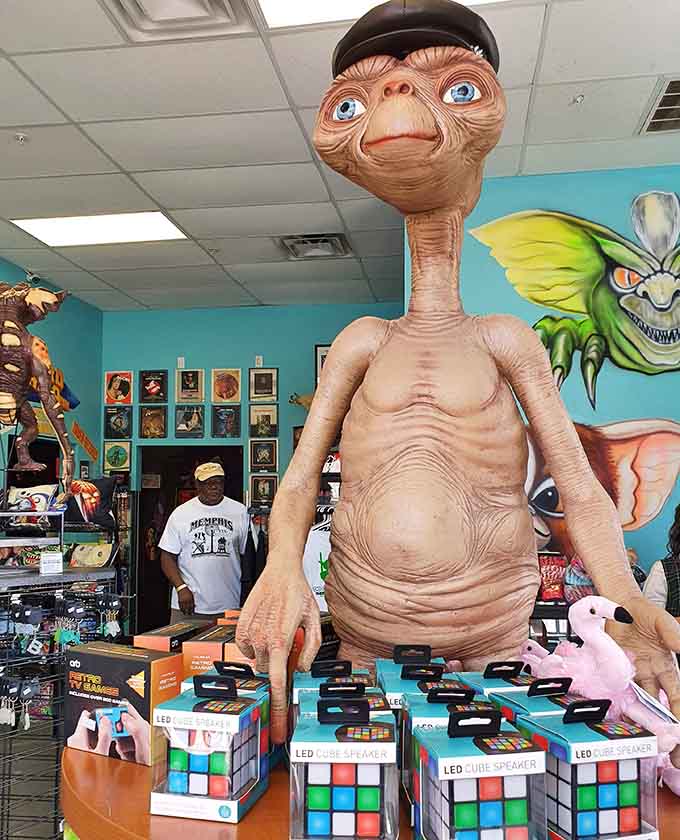 E.T. towers over Rubik's Cubes, two puzzles from the eighties that nobody could quite figure out.