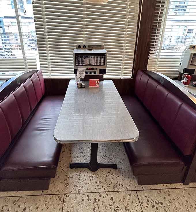 Each booth comes equipped with its own jukebox selector, because choosing your dining music should be a personal decision.