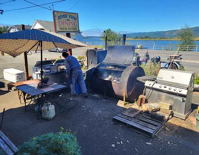 That massive outdoor smoker with river views proves they're serious about their craft and location.