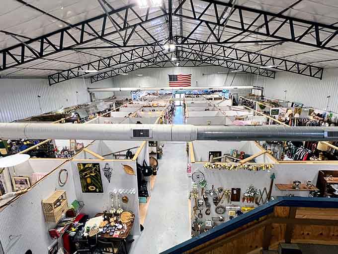 Endless aisles of antiques stretch beneath industrial ceilings where one person's attic becomes your next conversation piece.