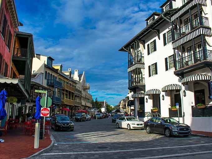 Striped awnings and architectural variety create streetscapes where every corner reveals another reason to slow down and simply look around.