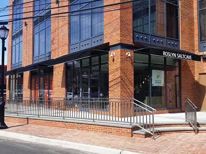 The modern storefront sits right in downtown Roslyn, hiding an ancient healing practice behind contemporary glass.