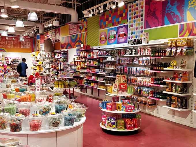 The candy store explodes with color like Willy Wonka's fever dream, offering sweet rewards for successful bargain hunting adventures.