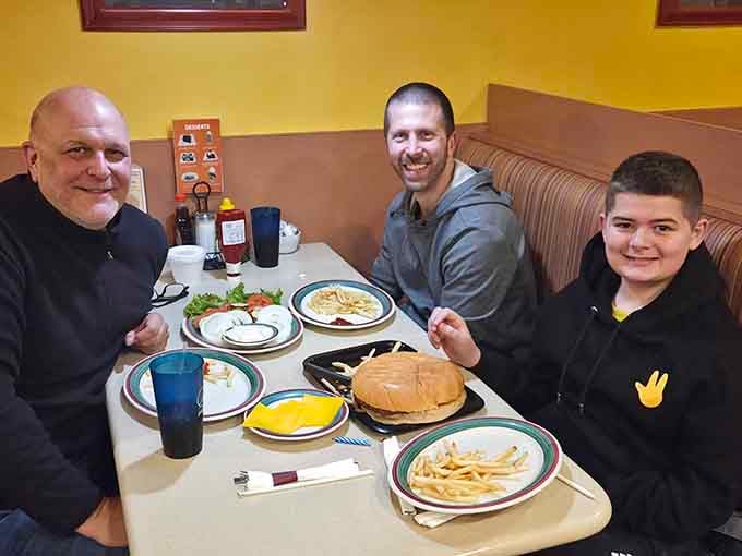 Happy diners enjoying their meals together, the universal sign that you've found a true neighborhood gem.