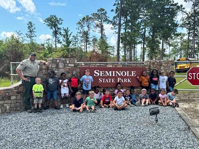 Young explorers gather at the entrance, ready to discover that the best adventures don't require screens or Wi-Fi.