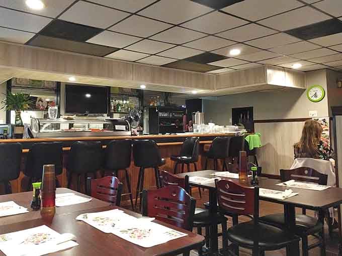 Counter seating with a view of the kitchen: watch the magic happen while you wait for your chicken.
