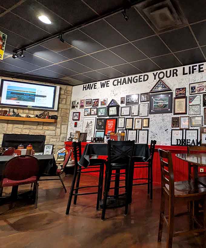 The "Have We Changed Your Life" wall suggests they're pretty confident about their smoked meats.