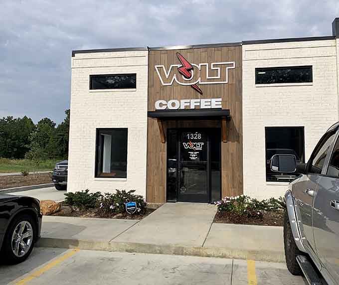 Modern coffee culture meets small-town charm, proving that even peaceful riverside communities need their caffeine fix done right.