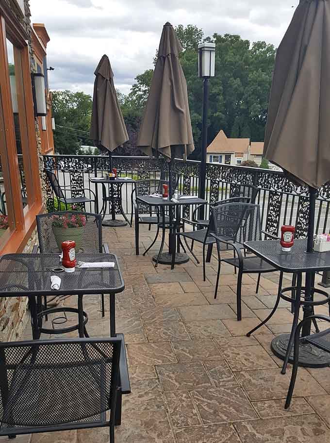 Outdoor patio seating offers fresh air dining with umbrellas for shade on those perfect New Jersey afternoons.