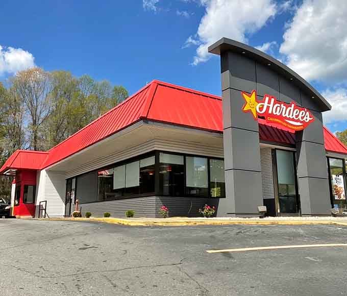 That bold red roof signals hot biscuits and familiar favorites await inside, because sometimes you just need reliable comfort food fast.