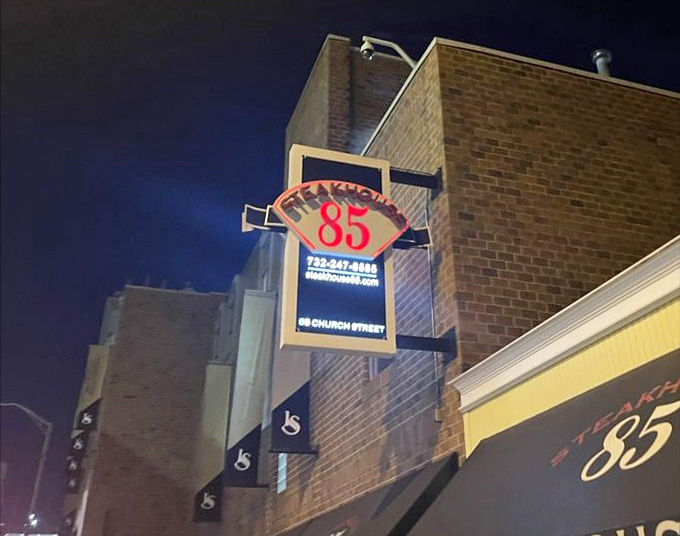 That illuminated sign glowing against the evening sky is like a lighthouse guiding hungry souls to their carnivorous destination tonight.