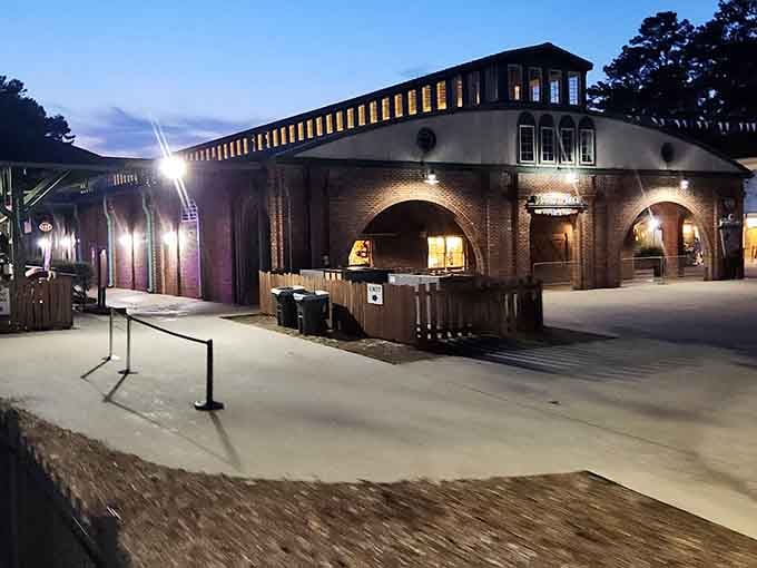 Evening transforms the depot into something from a classic film, all warm light and timeless railroad charm.