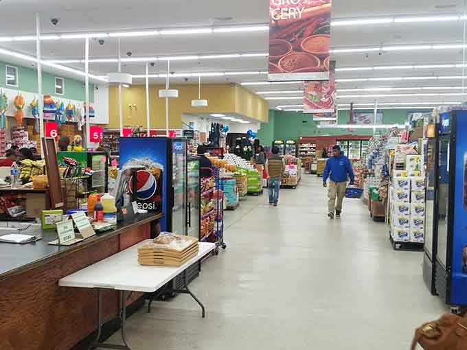 Wide aisles invite exploration like a museum, except everything here is edible and you can touch it.