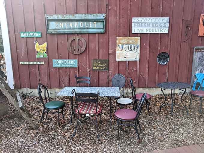 Vintage signs and mismatched chairs creating that perfect New England vibe you didn't know you needed.