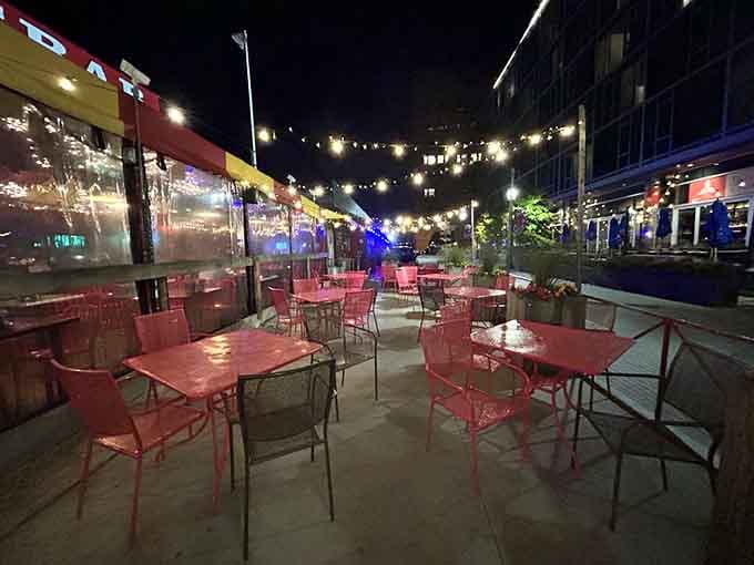 Evening lights transform the outdoor seating into Boston's best dinner theater, starring you and your seafood feast.